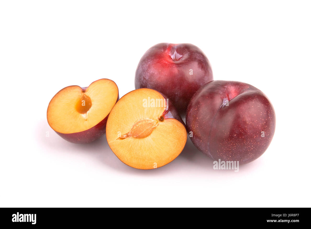 plums isolated on white background Stock Photo - Alamy