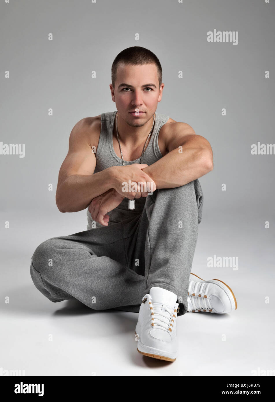 male fitness studio young trendy style seated sitting caucasian one ...