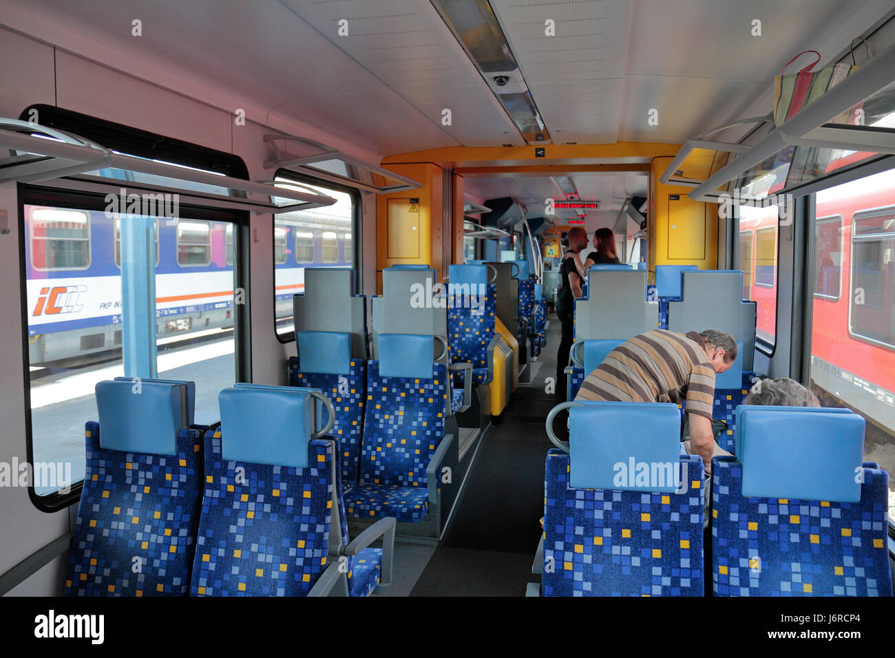 The seating inside a modern Stadler FLIRT train carriage on the ...