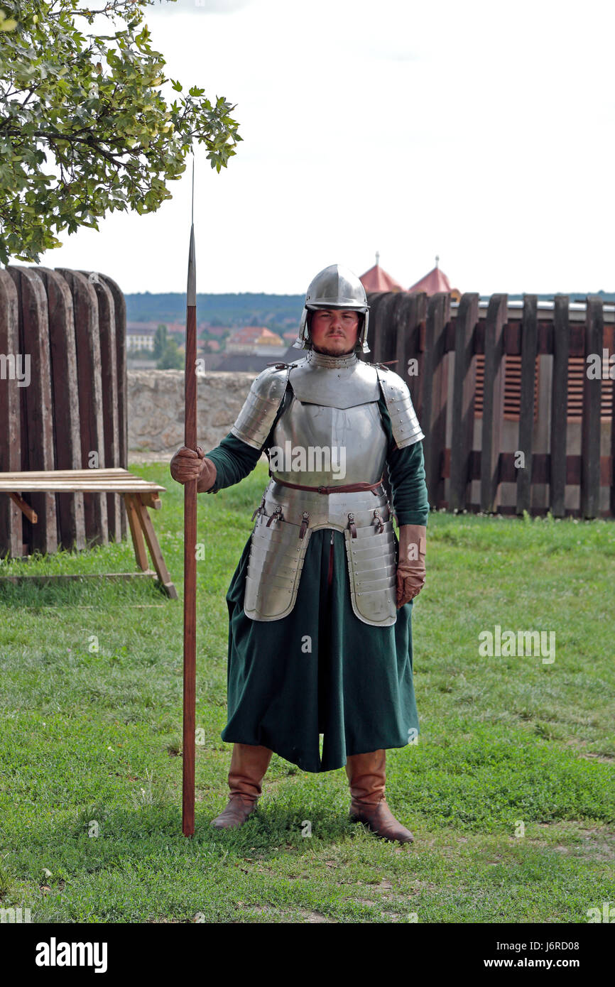 A young man dressed in steel armor during a display in the Castle of ...