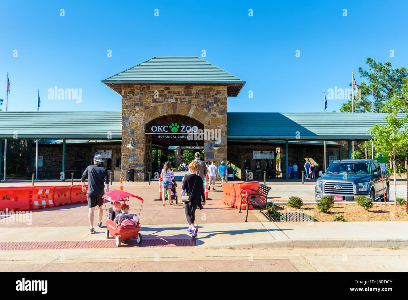 People flock to the entrance of the Oklahoma City Zoo on a beautiful ...