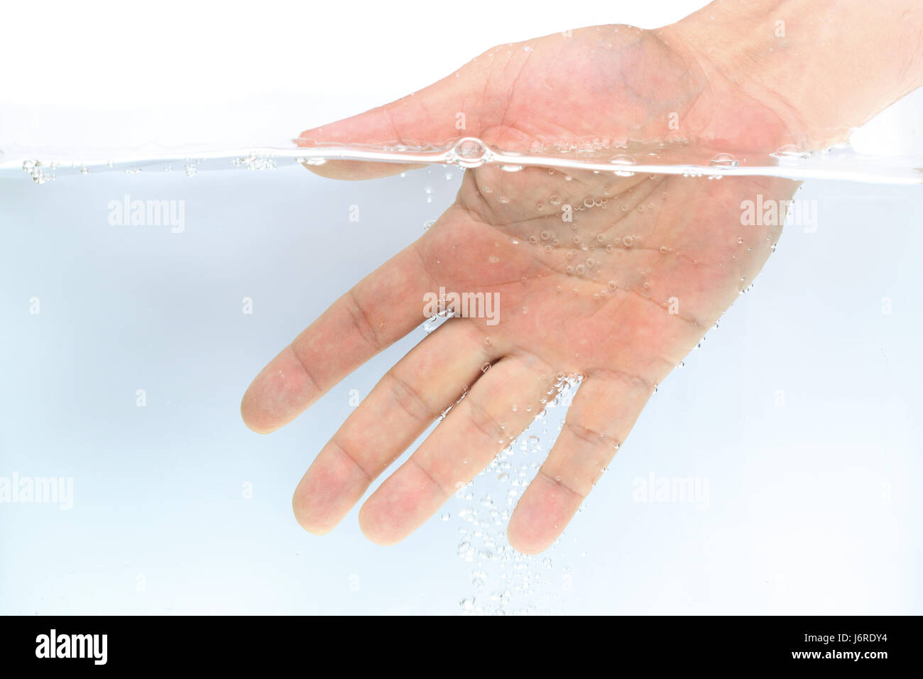 hand in water Stock Photo - Alamy