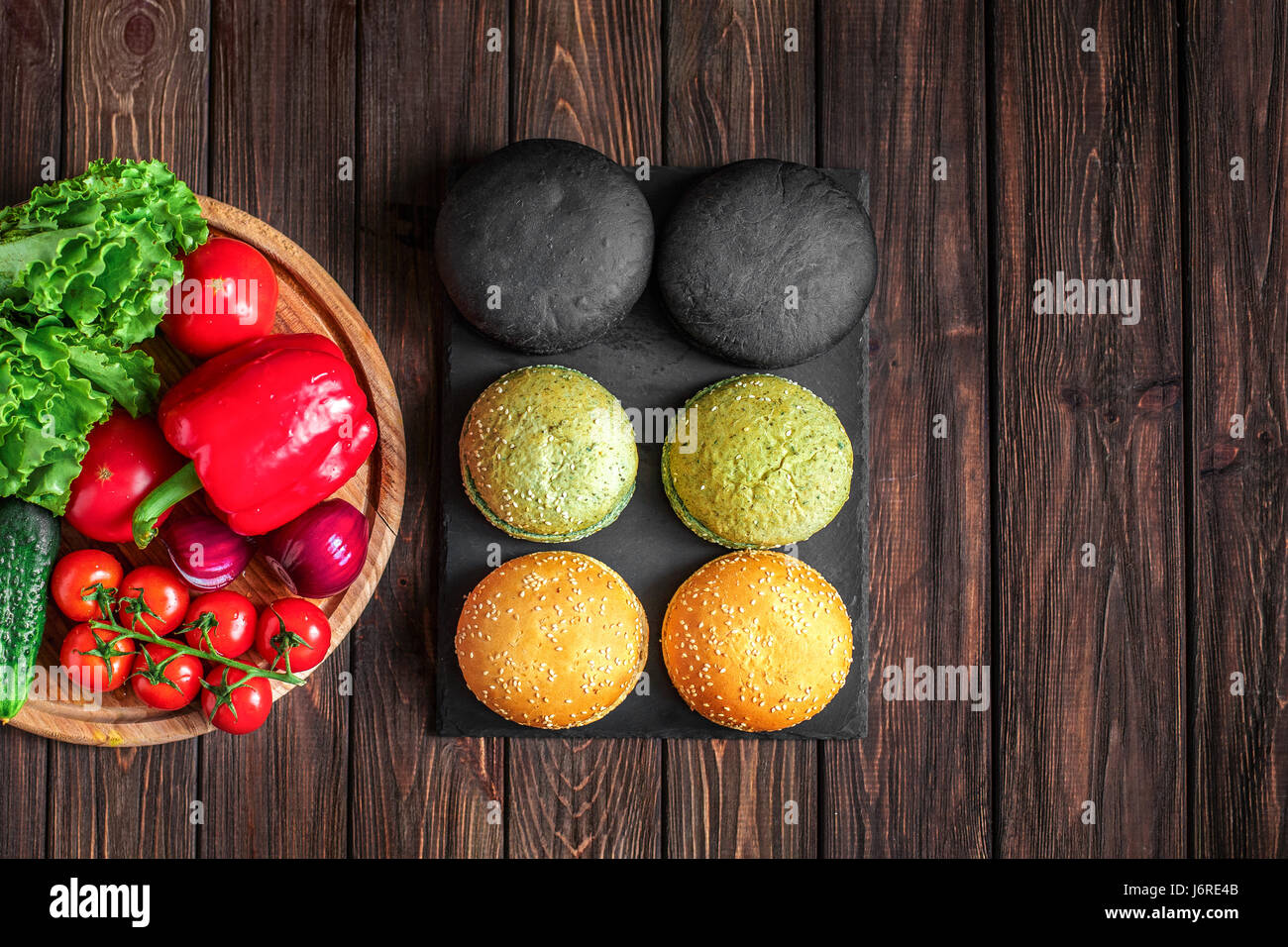 Different colored buns for burgers Stock Photo - Alamy