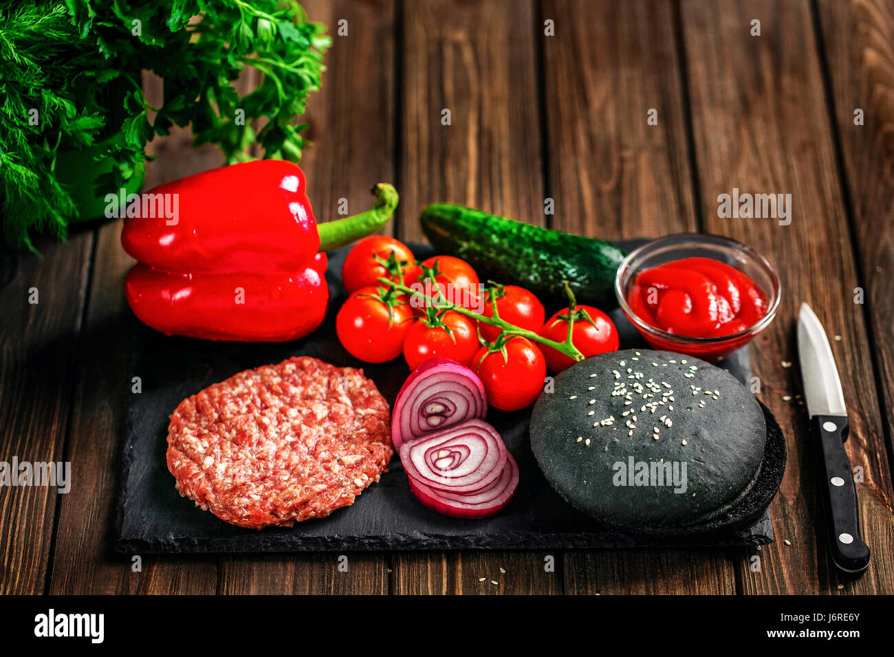 Preparation of burger Stock Photo - Alamy