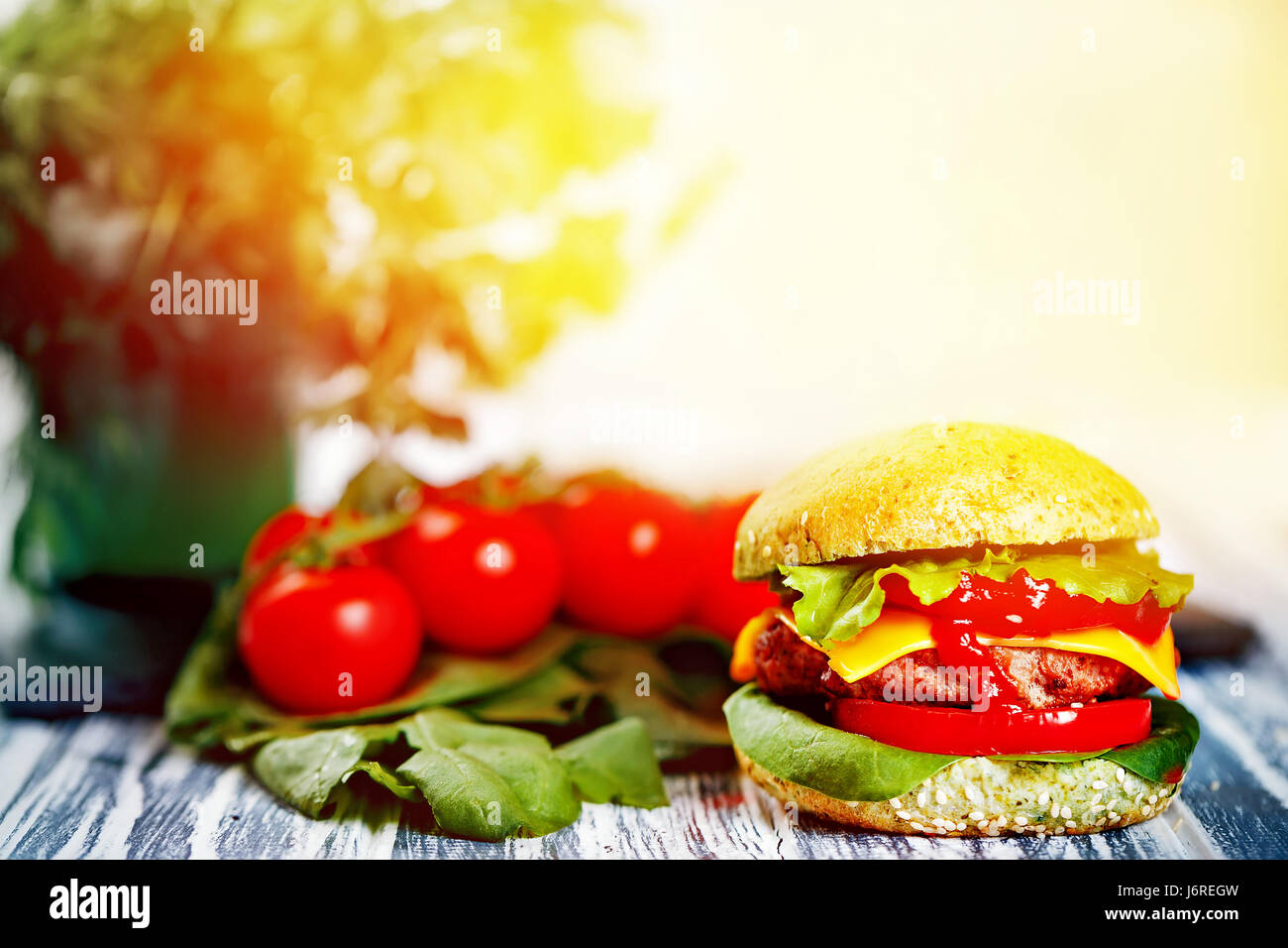 burger with green bun and fresh vegetables Stock Photo - Alamy