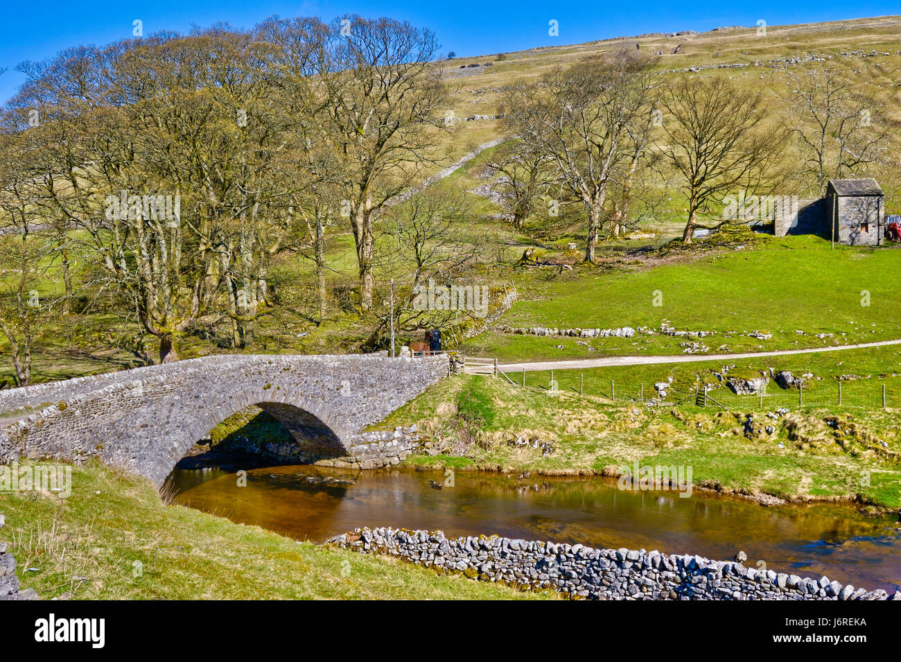 bridge architectural buildings tree trees stone bridge outdoor fields ...