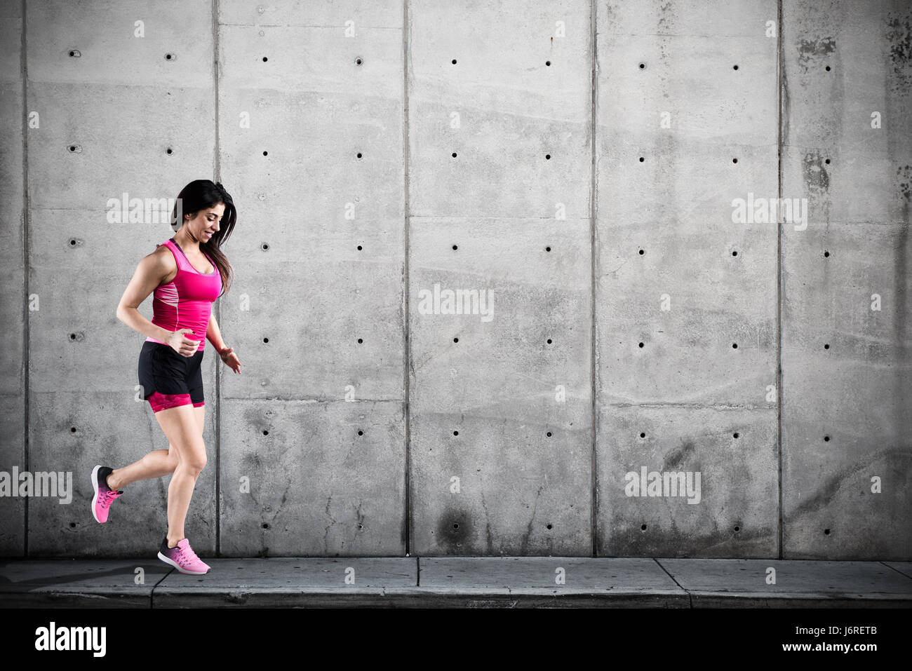 Athletic woman runner Stock Photo - Alamy