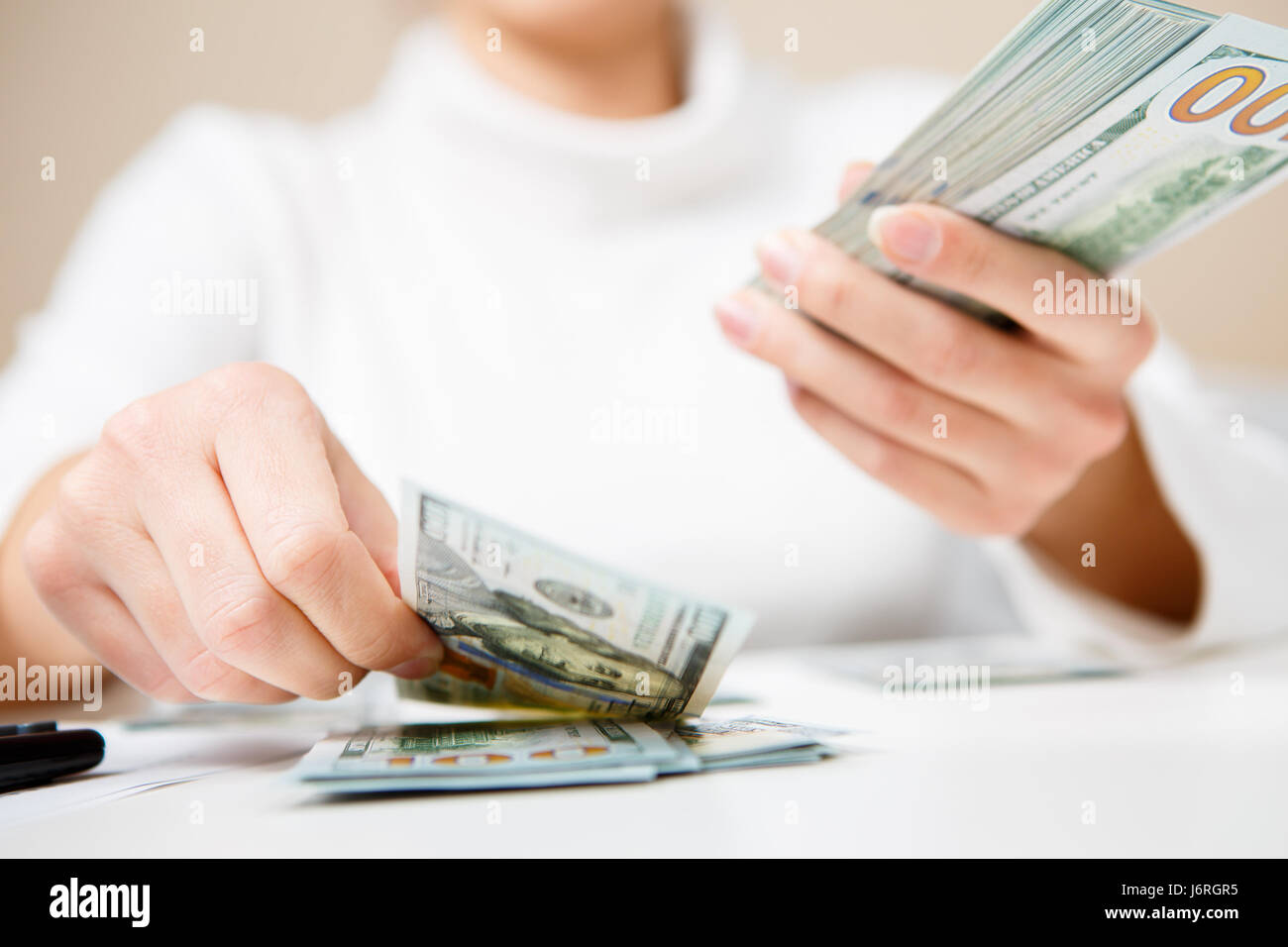Hands counting money, close up Stock Photo - Alamy