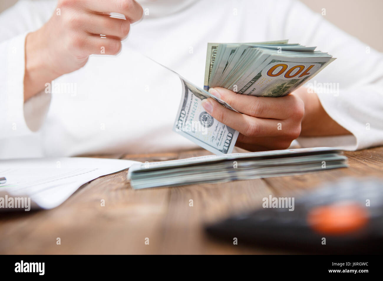Hands counting money, close up Stock Photo - Alamy