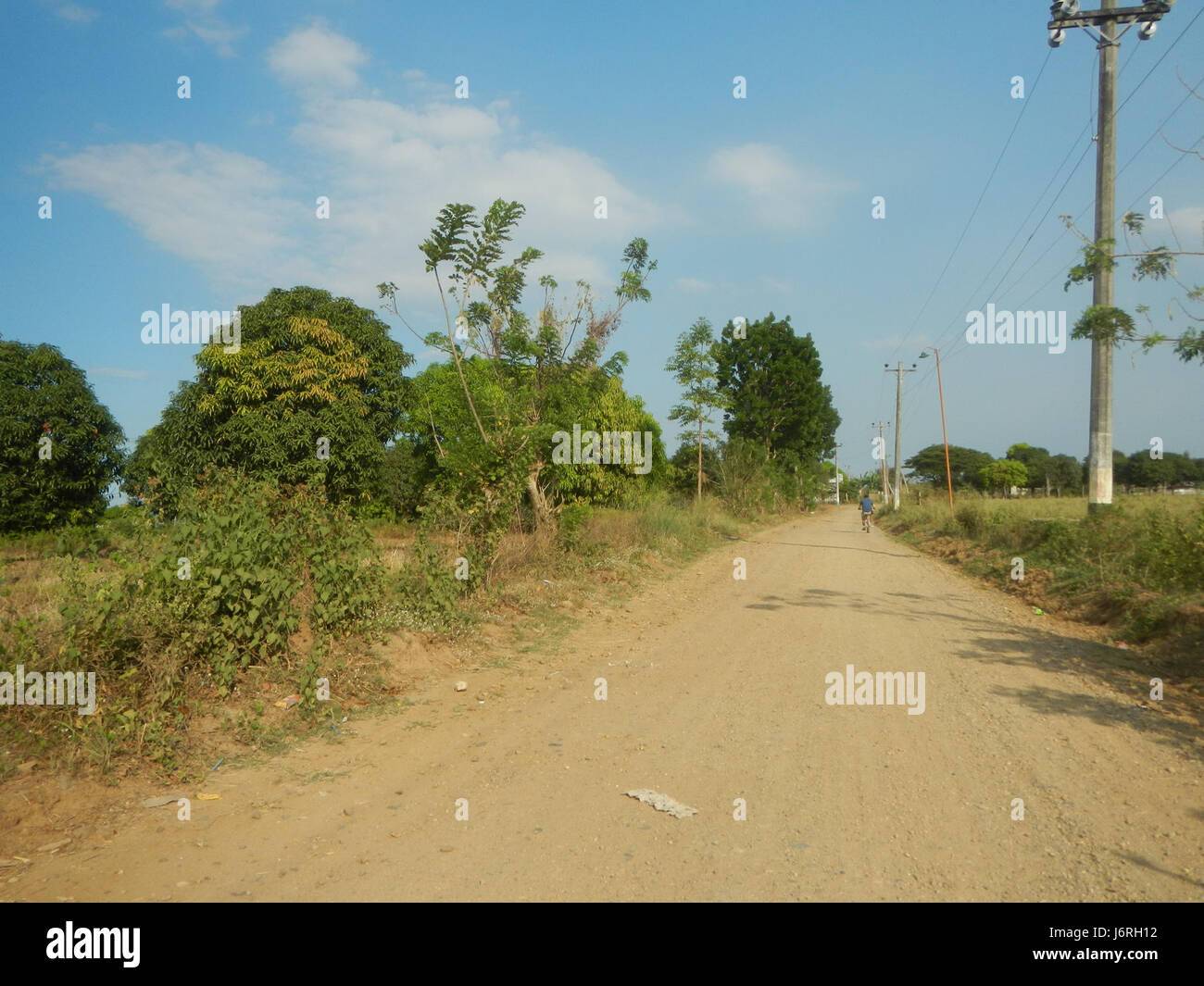 A view of San Rafael, Bulacan, depicting municipal roads and haystacks ...