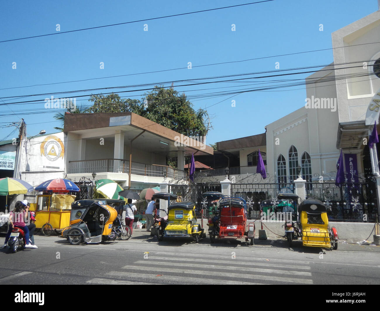 This image shows the Pasyon Pabasa, a religious tradition in Bulacan ...