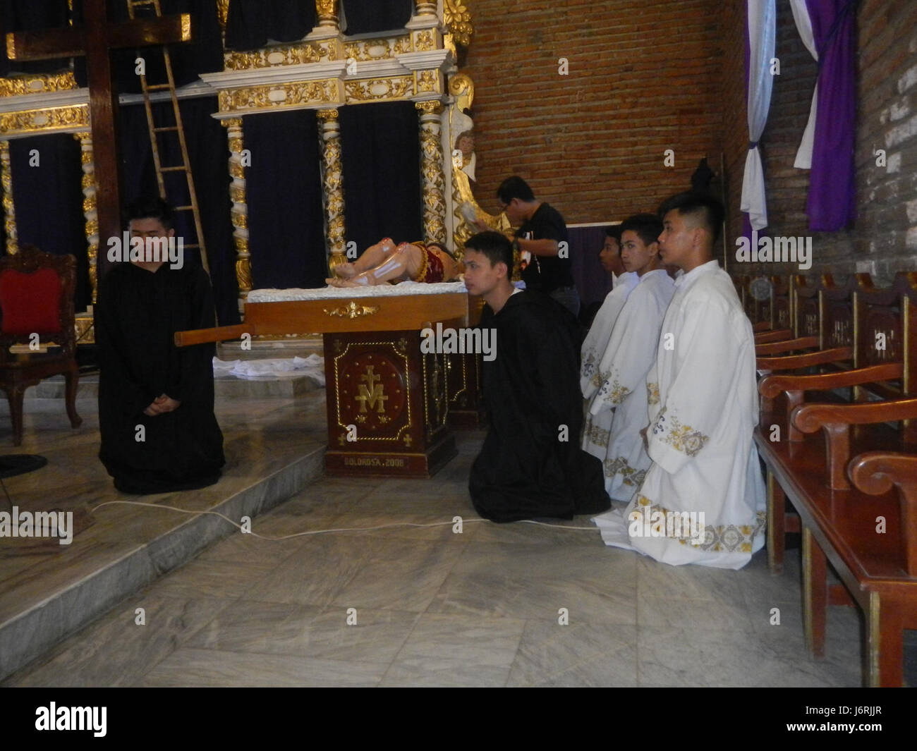 The image shows the 2017 Good Friday Veneration of the Cross at Santa ...