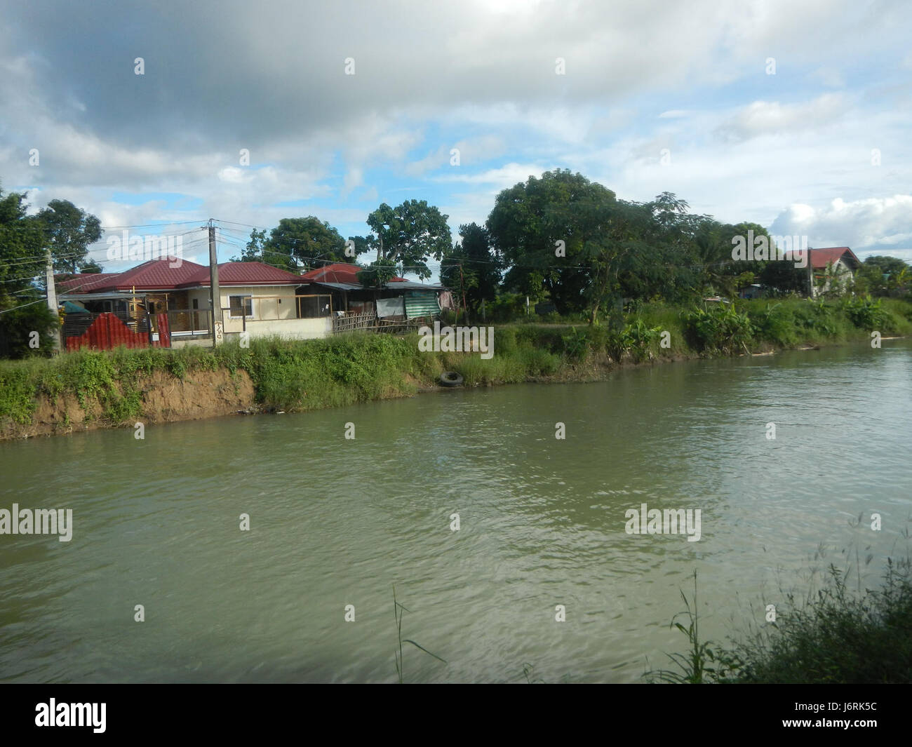 The image depicts the rural landscape of Talampas, Bustos, Bulacan ...
