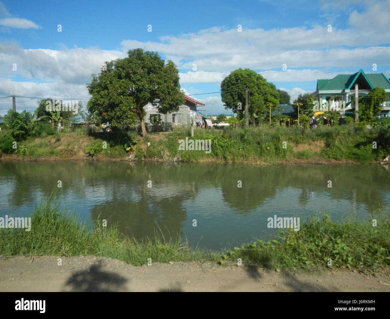 This image depicts the rural landscape of Talampas, Bustos, Bulacan ...