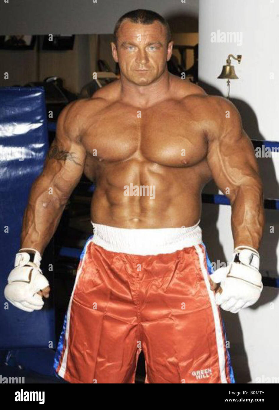 This image references Mariusz Pudzianowski, a renowned Polish strongman ...