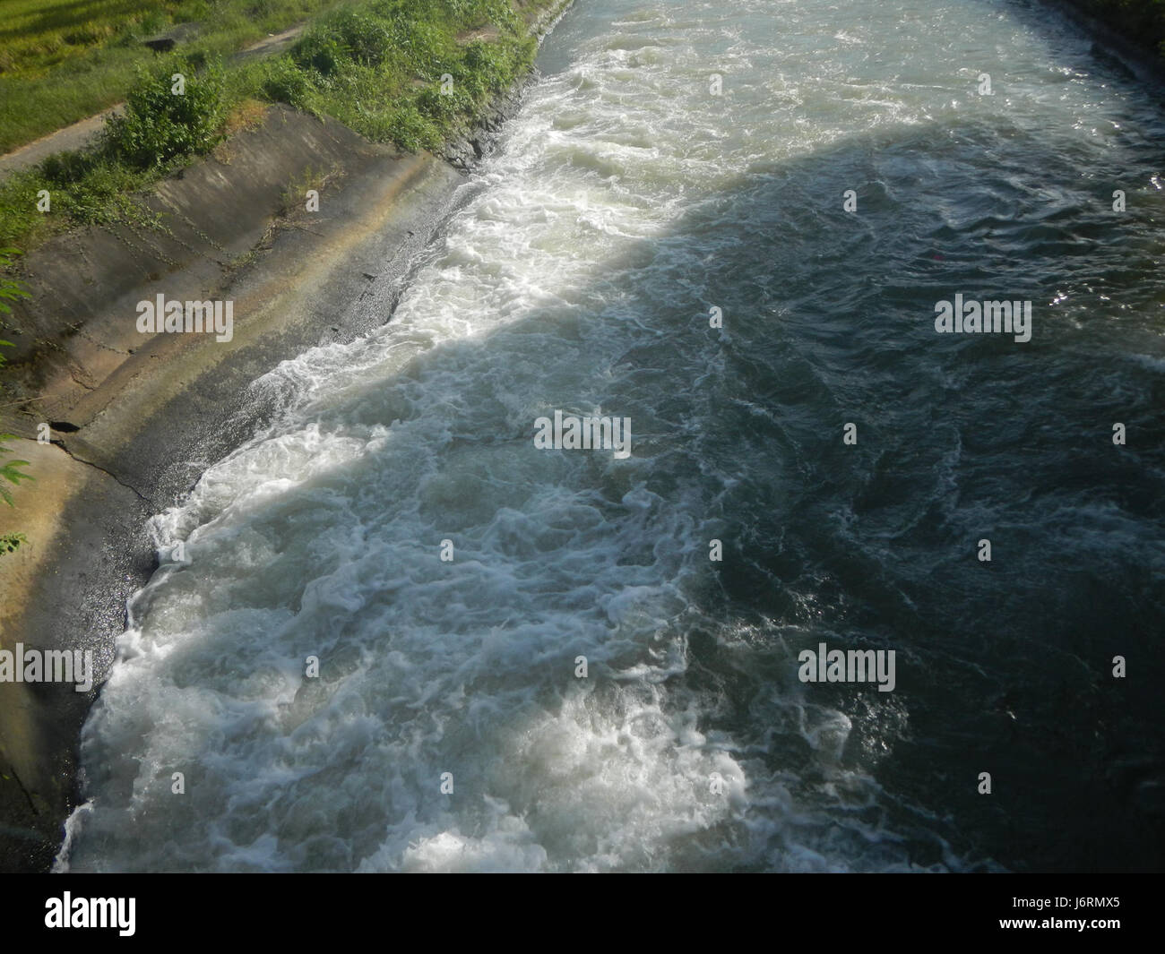 This image depicts the agricultural landscape of Talampas and Bustos in ...