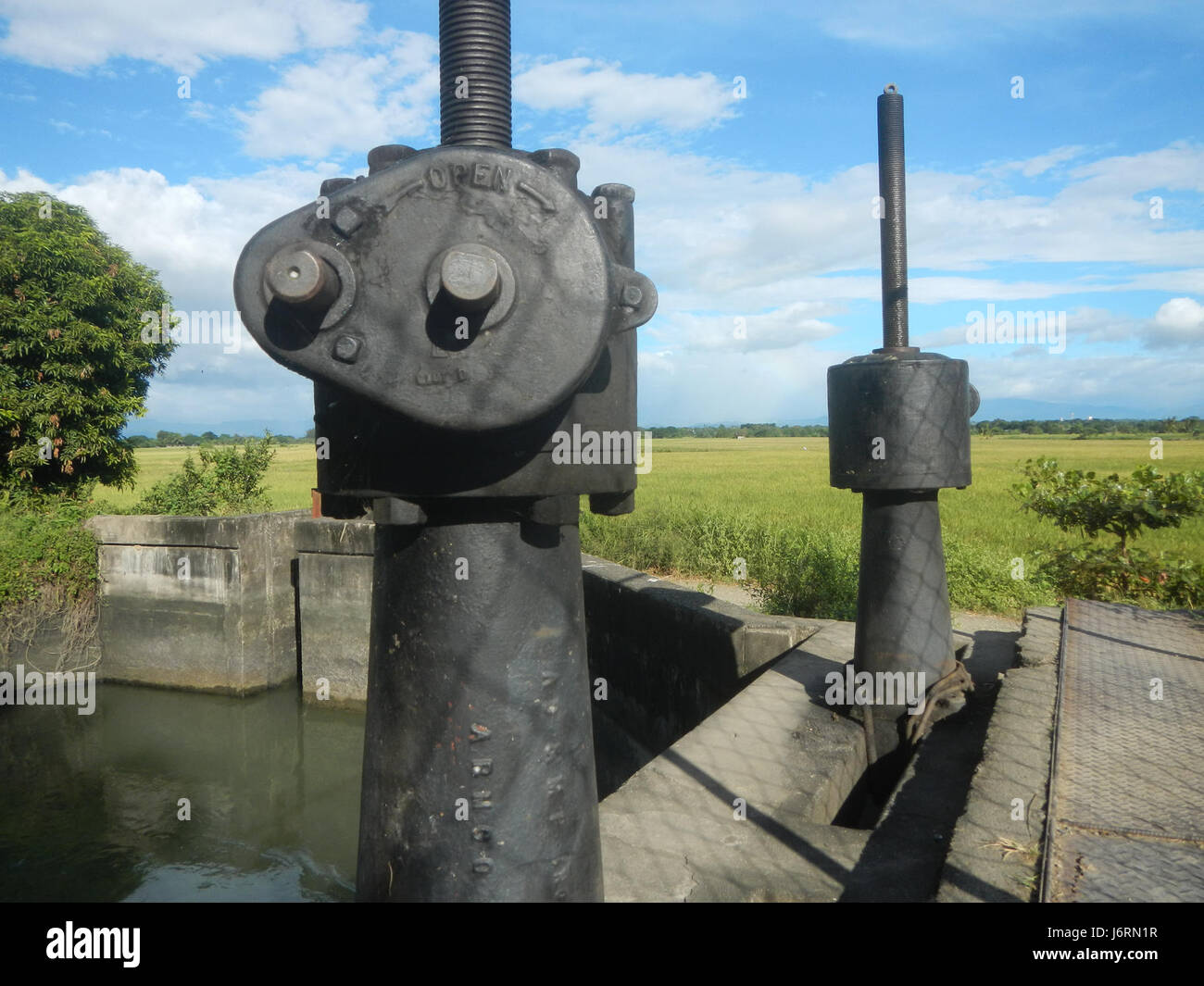A scene from the paddy fields and irrigation canals along Farm to ...