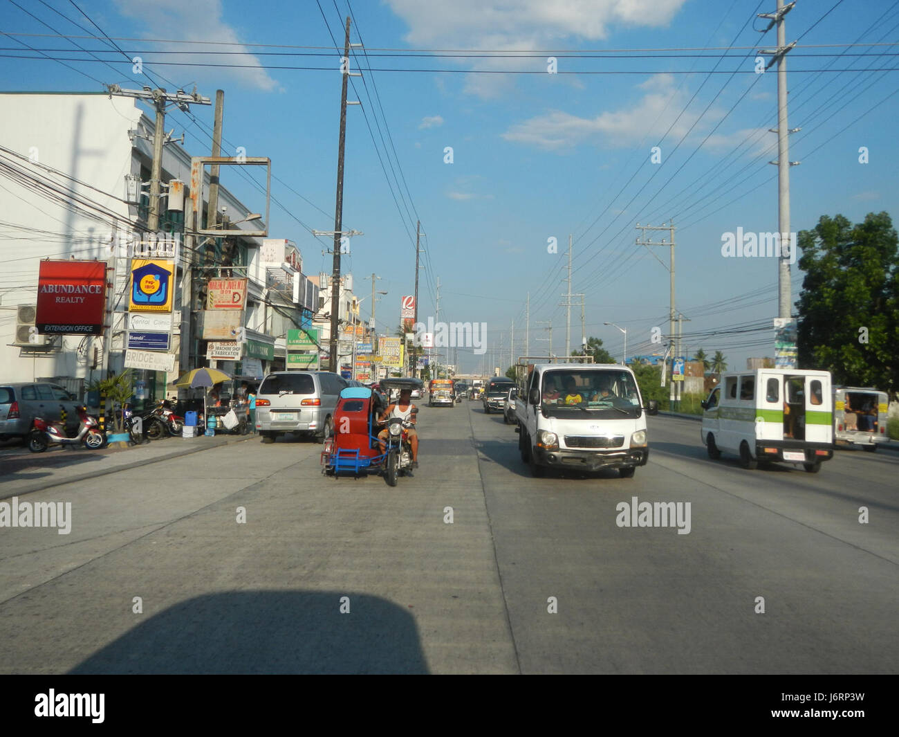 This image or reference depicts MacArthur Highway in Malolos City ...