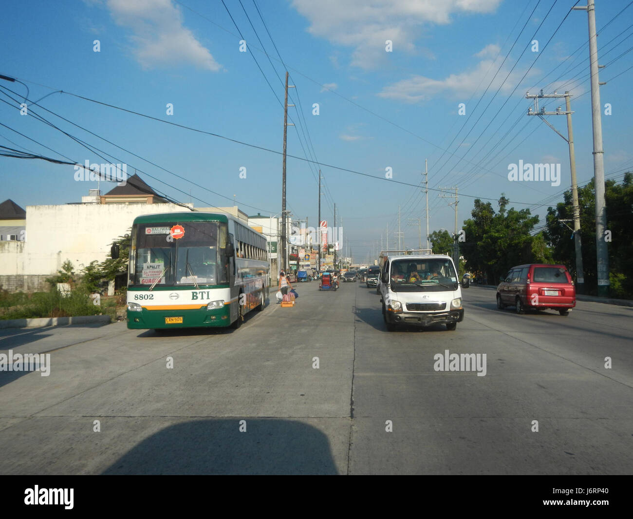This image shows MacArthur Highway, a major road running through ...