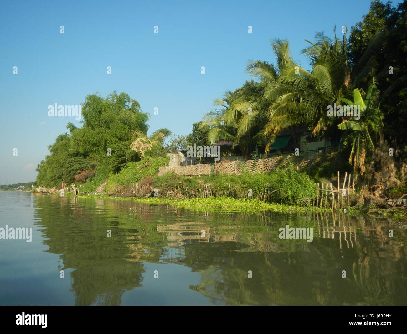 This image captures the serene riverside districts of Calumpit, Bulacan ...