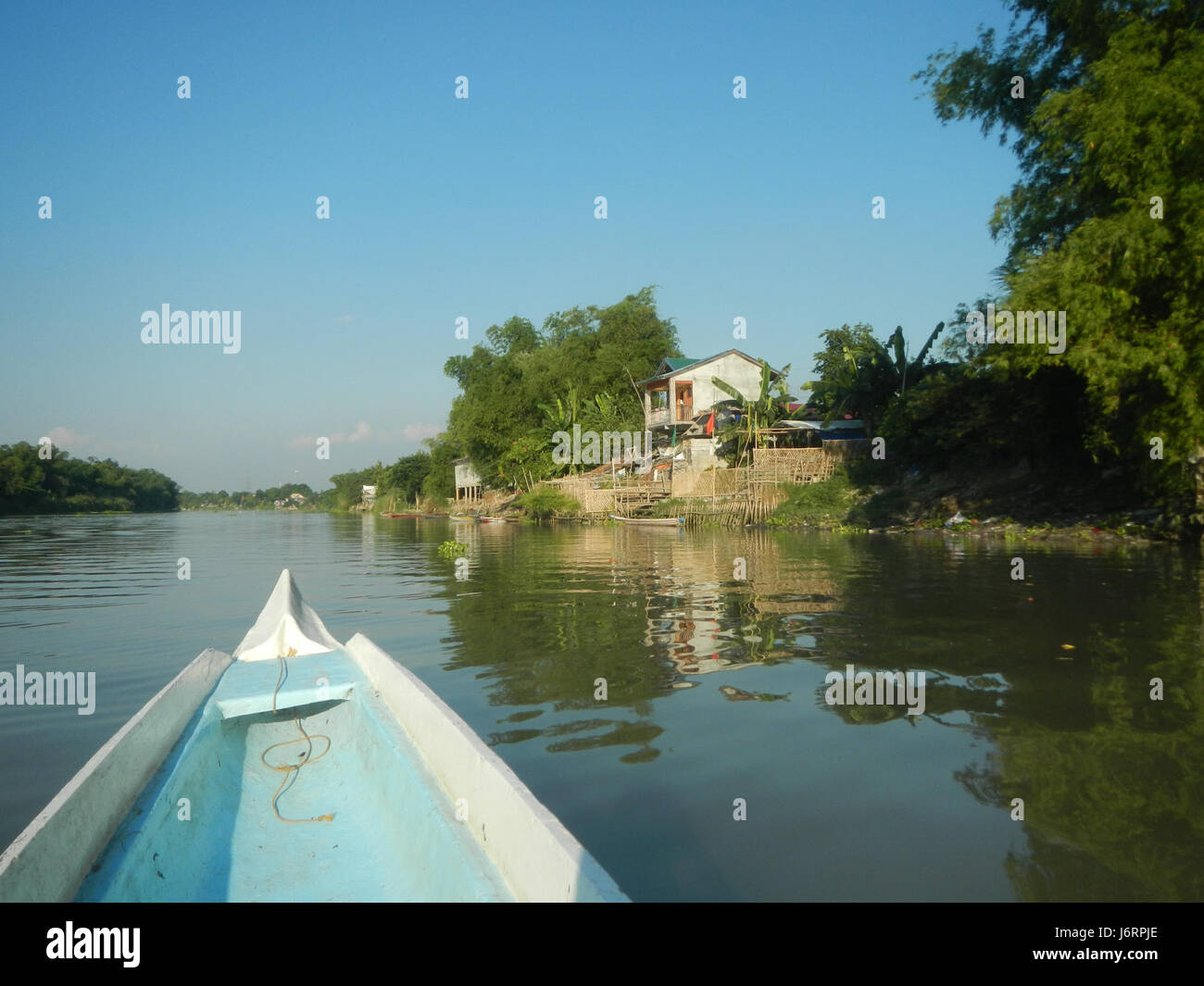 This image presents the scenic riverside districts of Calumpit, Bulacan ...