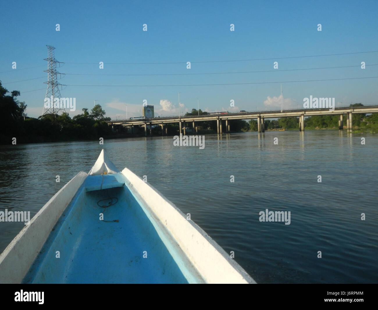 This view shows the riverside districts of Calumpit in Bulacan and ...