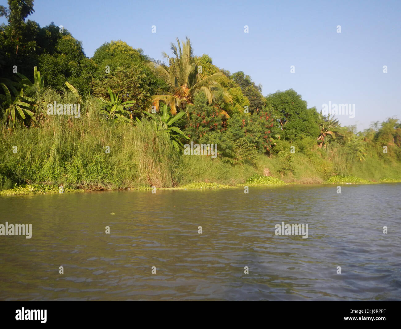 This image depicts the riverside districts of Calumpit, Bulacan, and ...