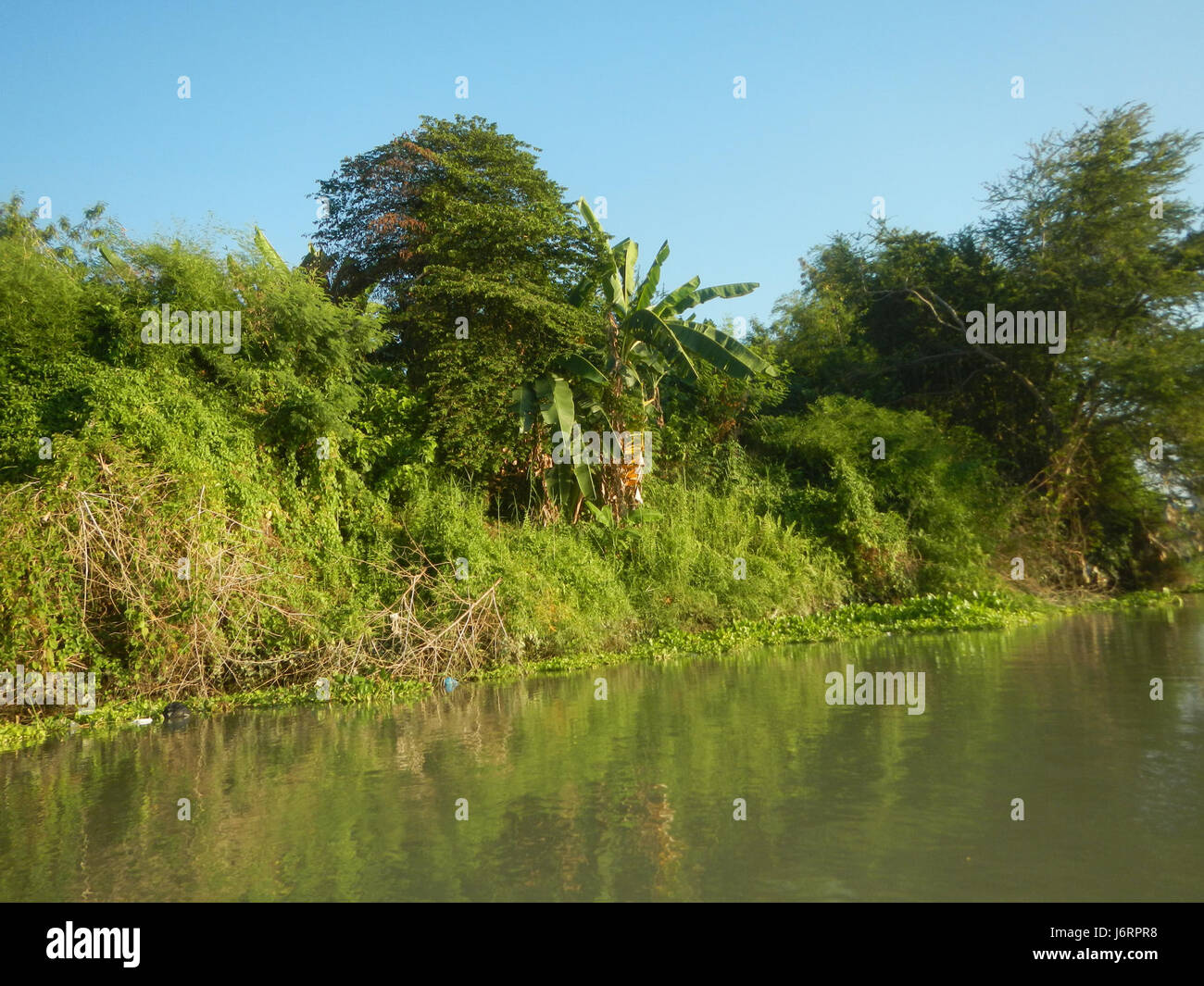 This image presents the riverside districts in Calumpit, Bulacan, and ...
