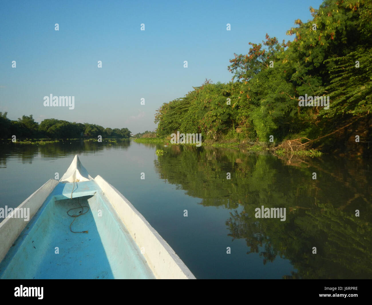 This photograph captures the riverside districts of Calumpit, Bulacan ...