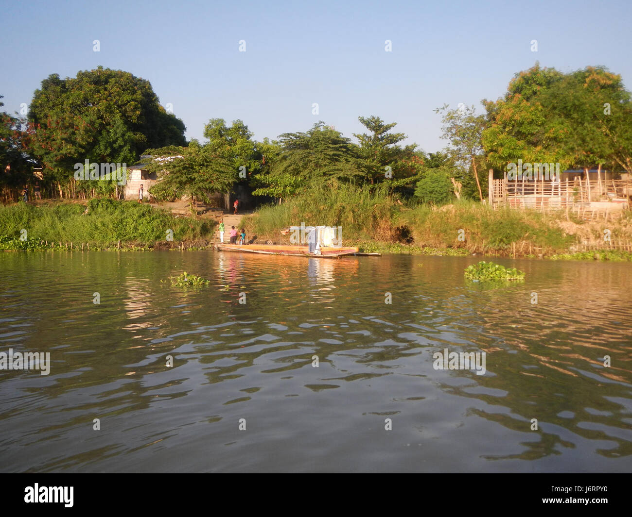 This photograph captures the Riverside Districts along the Calumpit ...