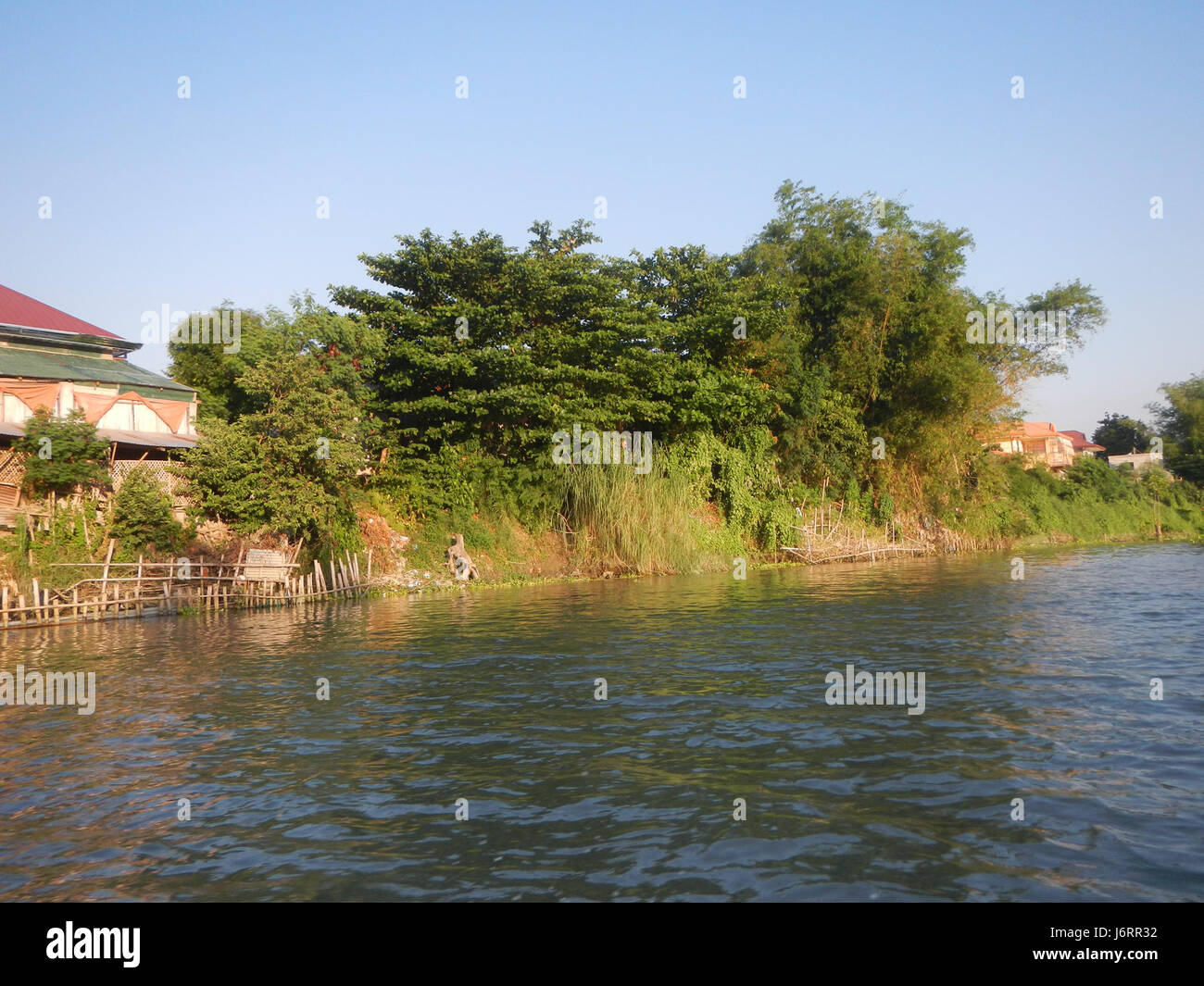 This photograph captures the riverside districts of Calumpit, Bulacan ...