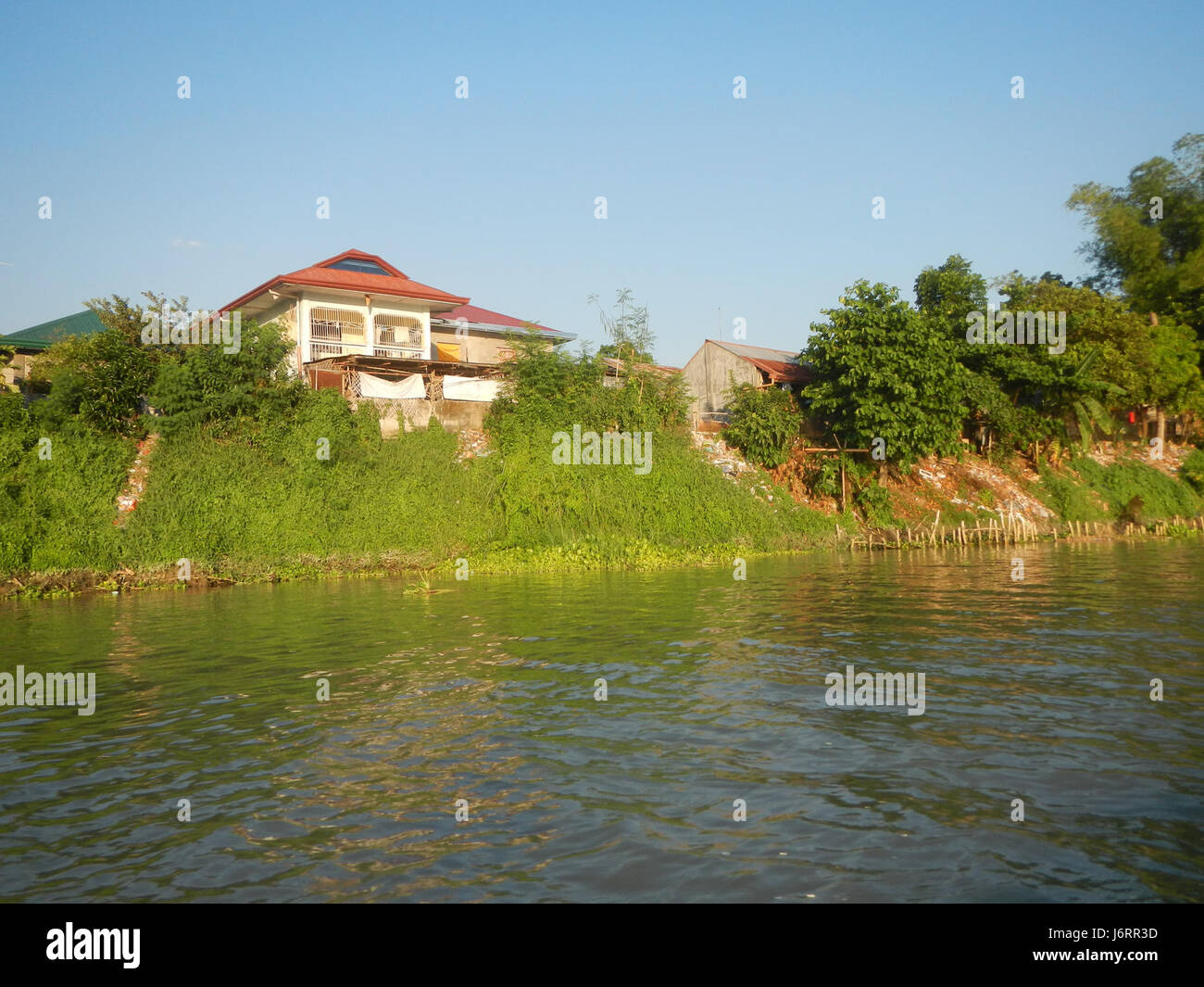 This image captures the riverside districts of Calumpit, Bulacan, and ...