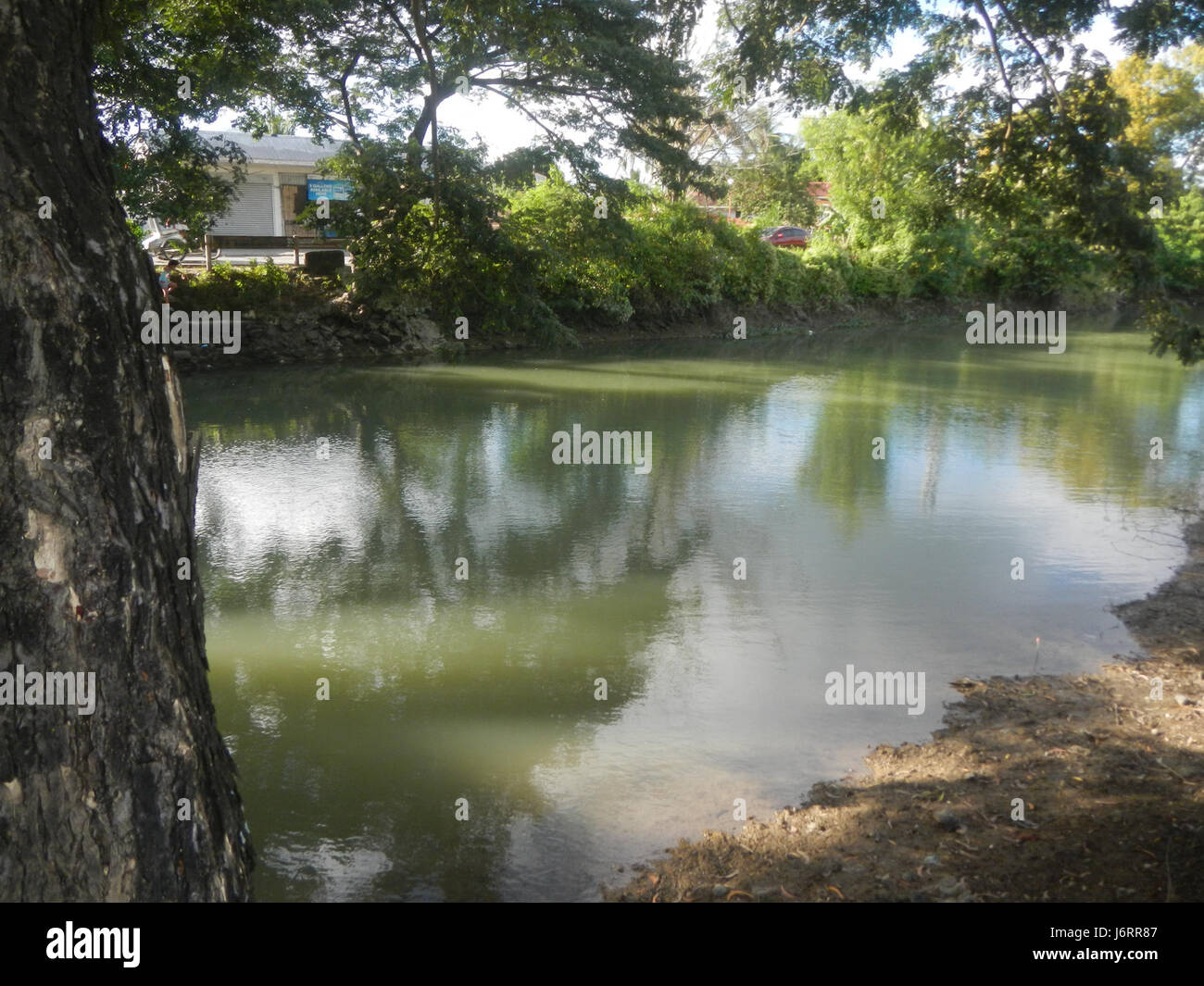 The image captures a rural landscape in Talampas, Bustos, Bulacan ...