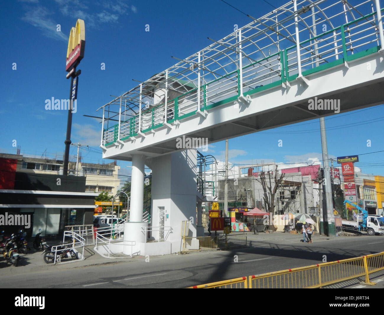 An image capturing a section of MacArthur Highway, passing through ...