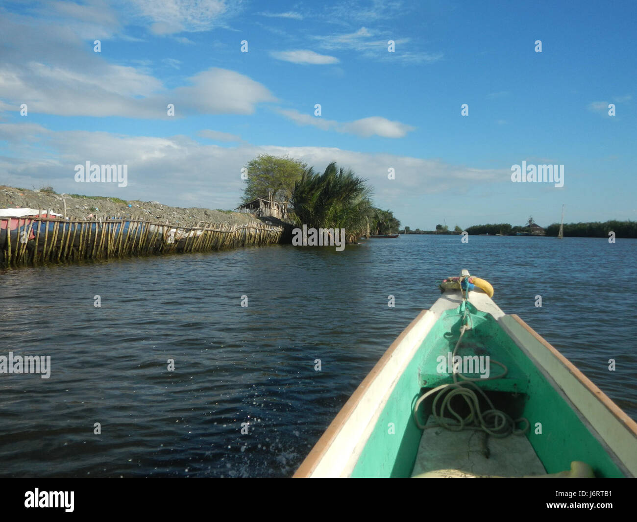 The river banks of Atlag and Panasahan in Malolos City, Bulacan, are ...