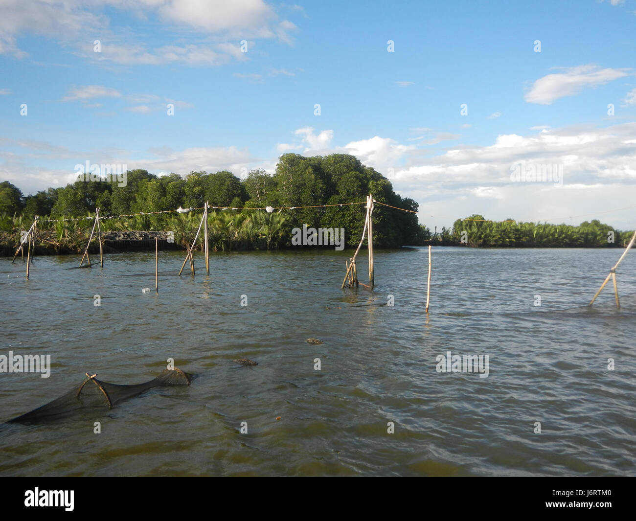 The image shows the river districts along the banks of the Bulakan ...