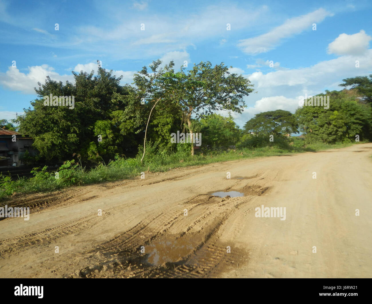 This image shows the paddy fields and irrigation canals along the Farm ...