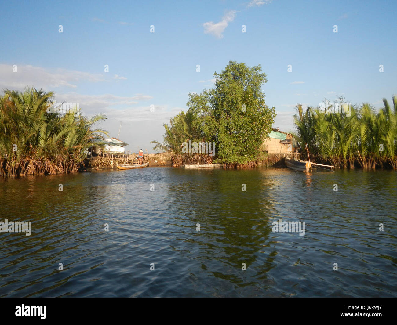 This image depicts the Panasahan and San Nicolas River banks in the ...