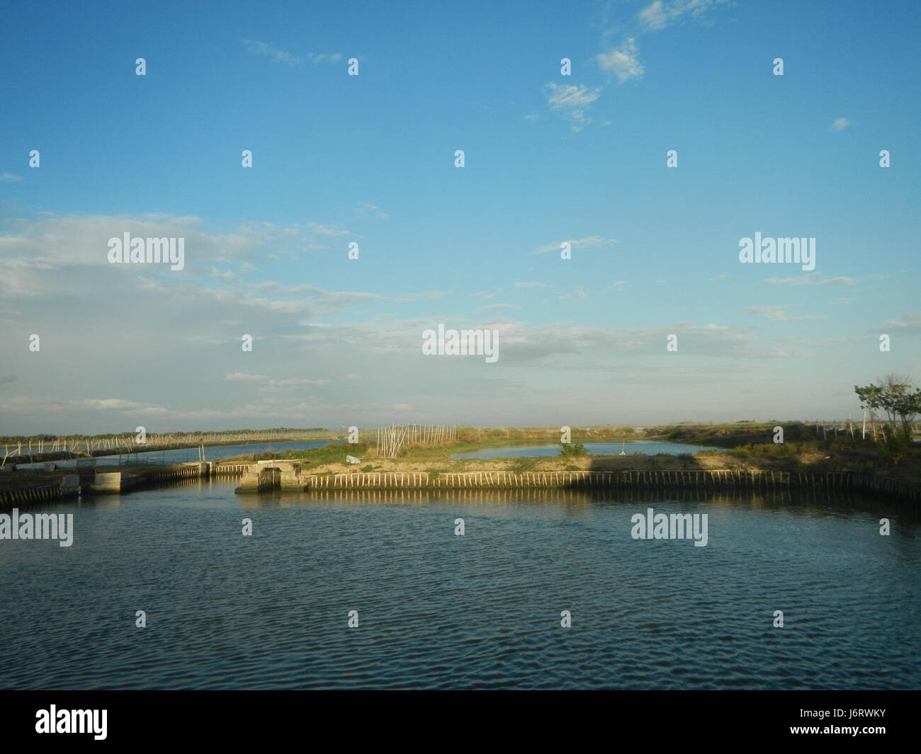 This scene depicts the riverbanks of the Panasahan and San Nicolas ...