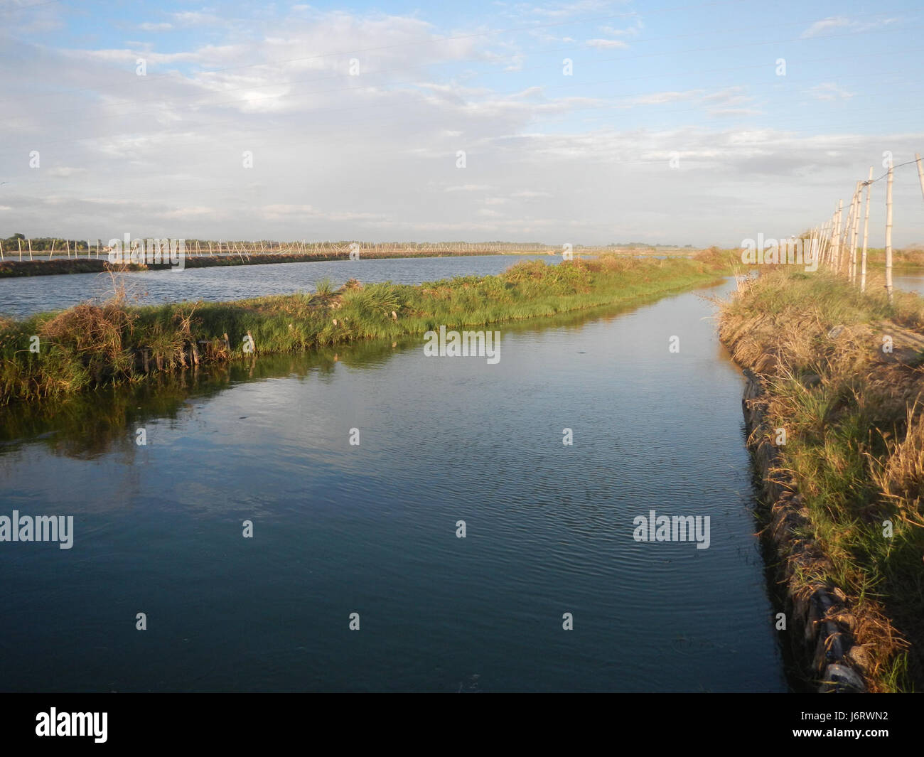 This image captures the riverbanks of the Panasahan and San Nicolas ...