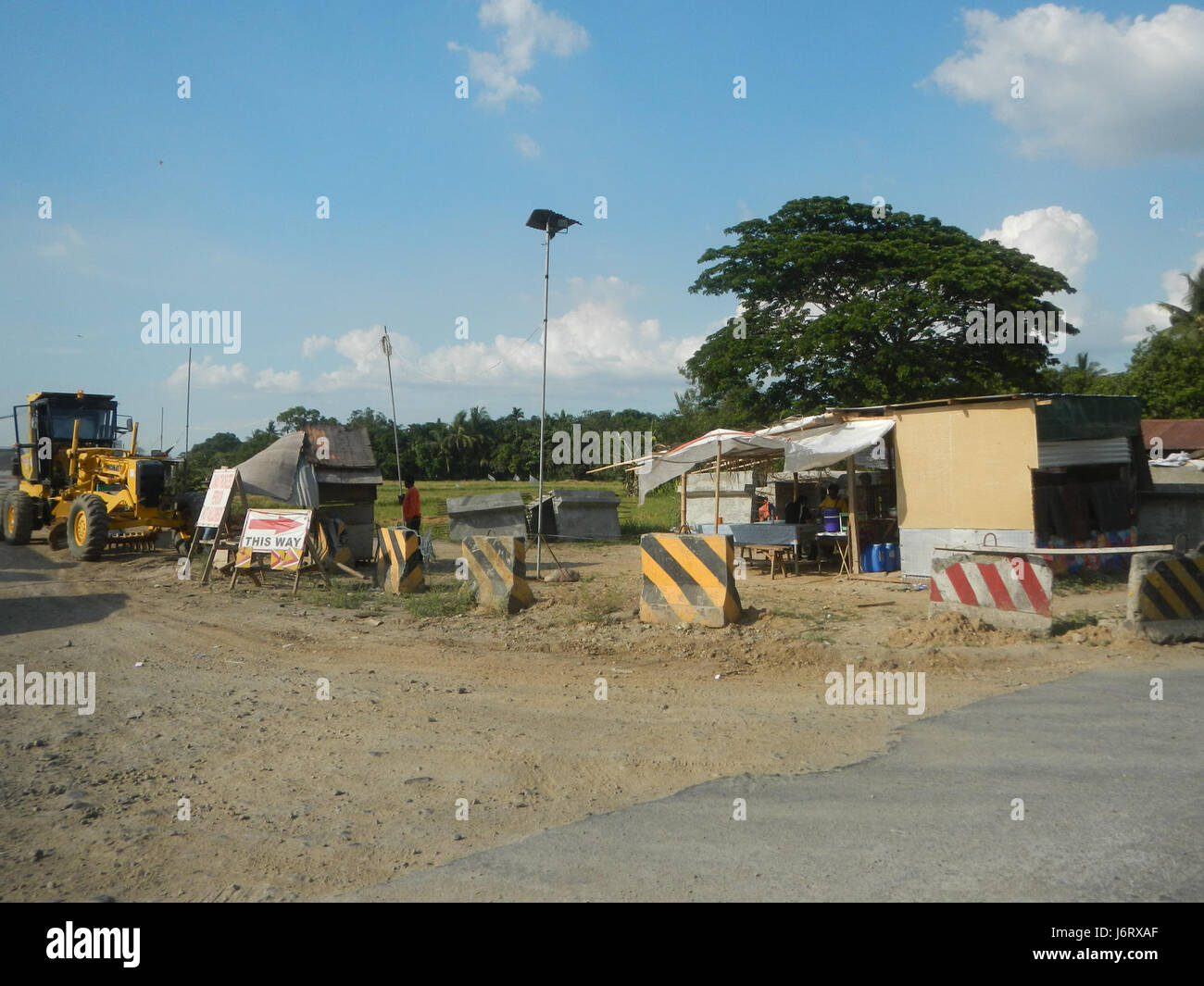 This reference highlights the construction activities in Tibag, Dulong ...