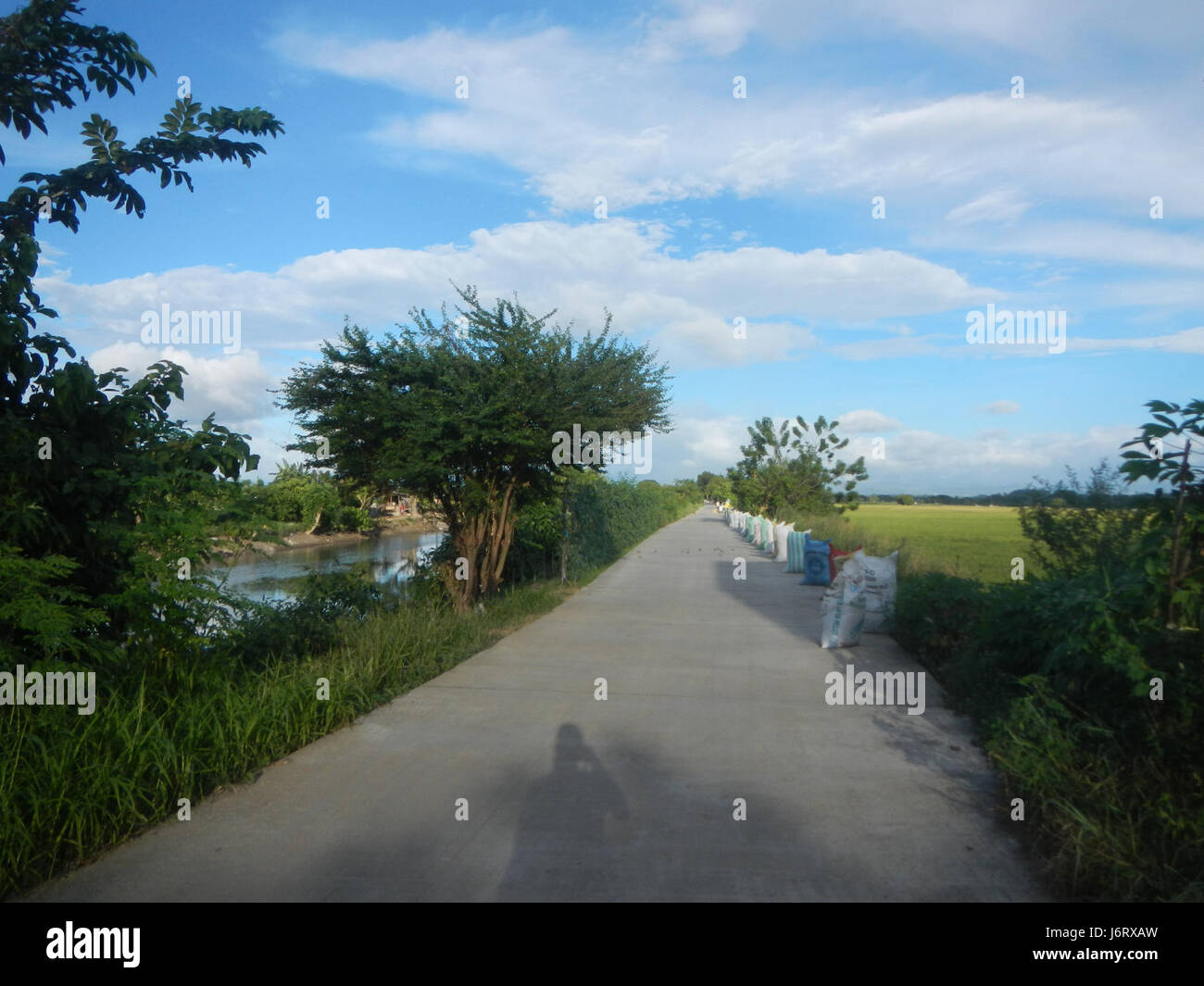 This photograph captures the rural agricultural landscape of Talampas ...
