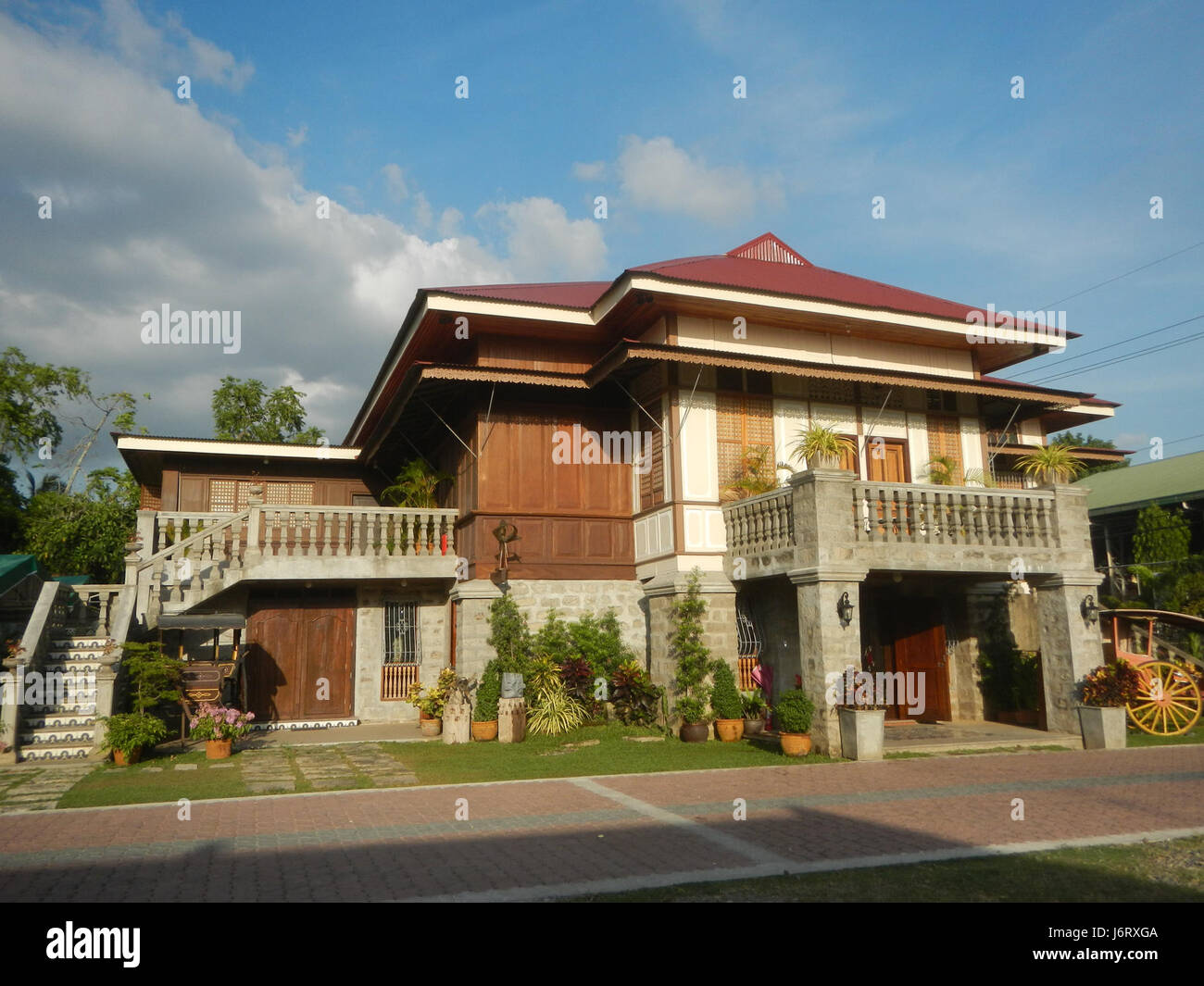 The image depicts houses in Dayap, Pulilan, Bulacan, a region known for its landmarks and rural ...