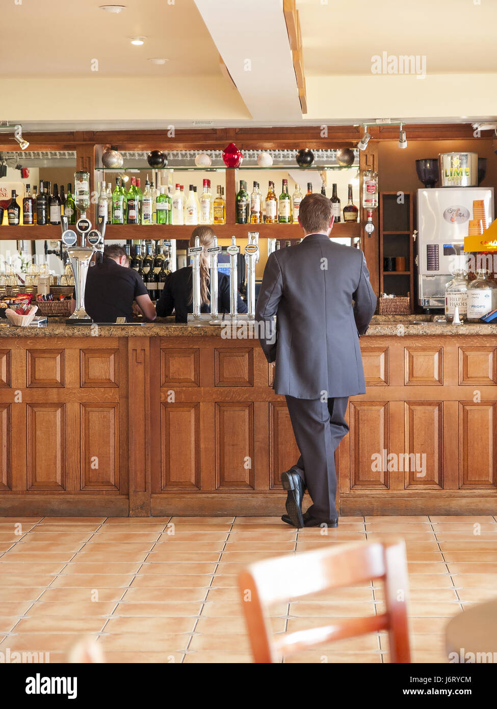 Waiting at the Bar Stock Photo - Alamy