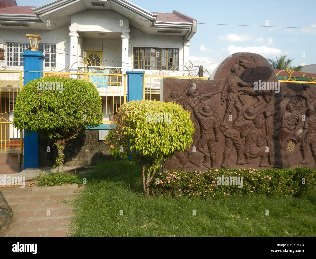 This image features the Bulacan Municipal Hall, a government building ...