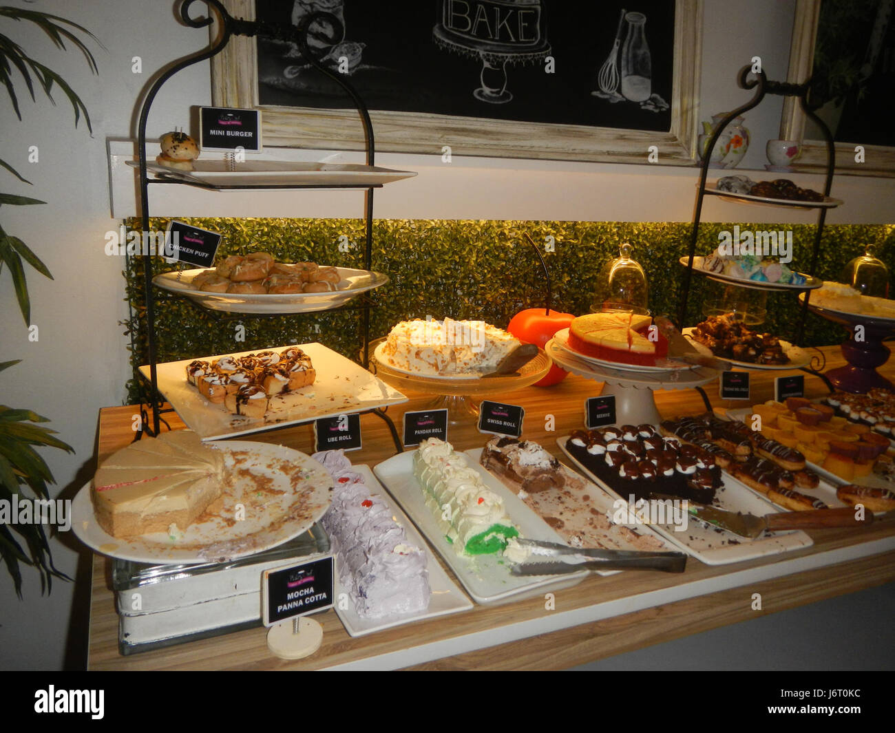 This image showcases a variety of cakes and pastries from a bakery in ...