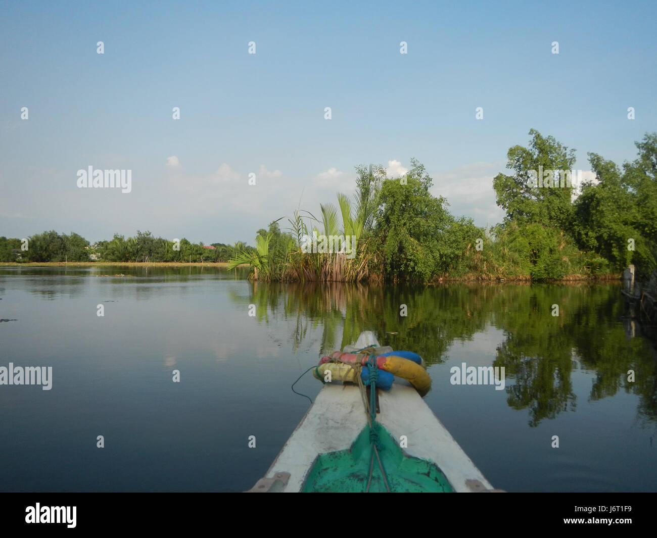 This image features the Malolos River Districts in Bulacan, Philippines ...