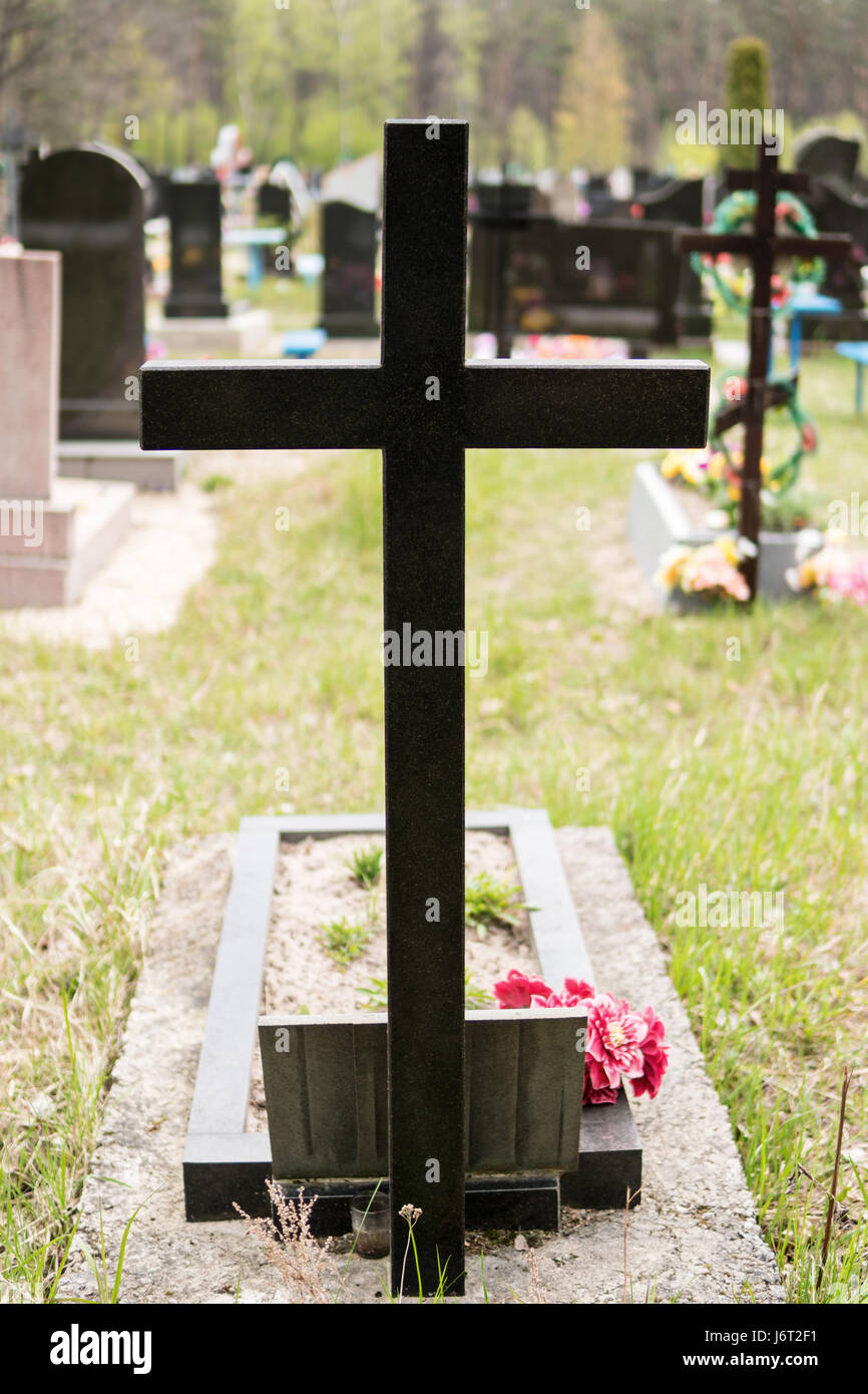 Cross over grave christian cemetery hi-res stock photography and images ...