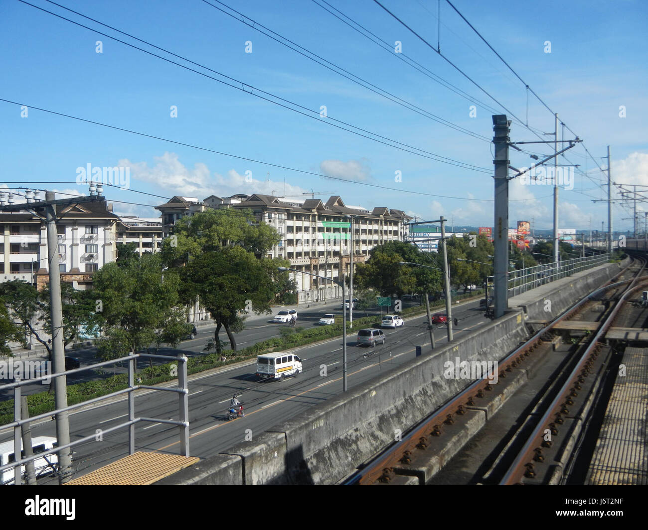 A detailed photograph of SM City Marikina, showing the flyover, Marcos ...