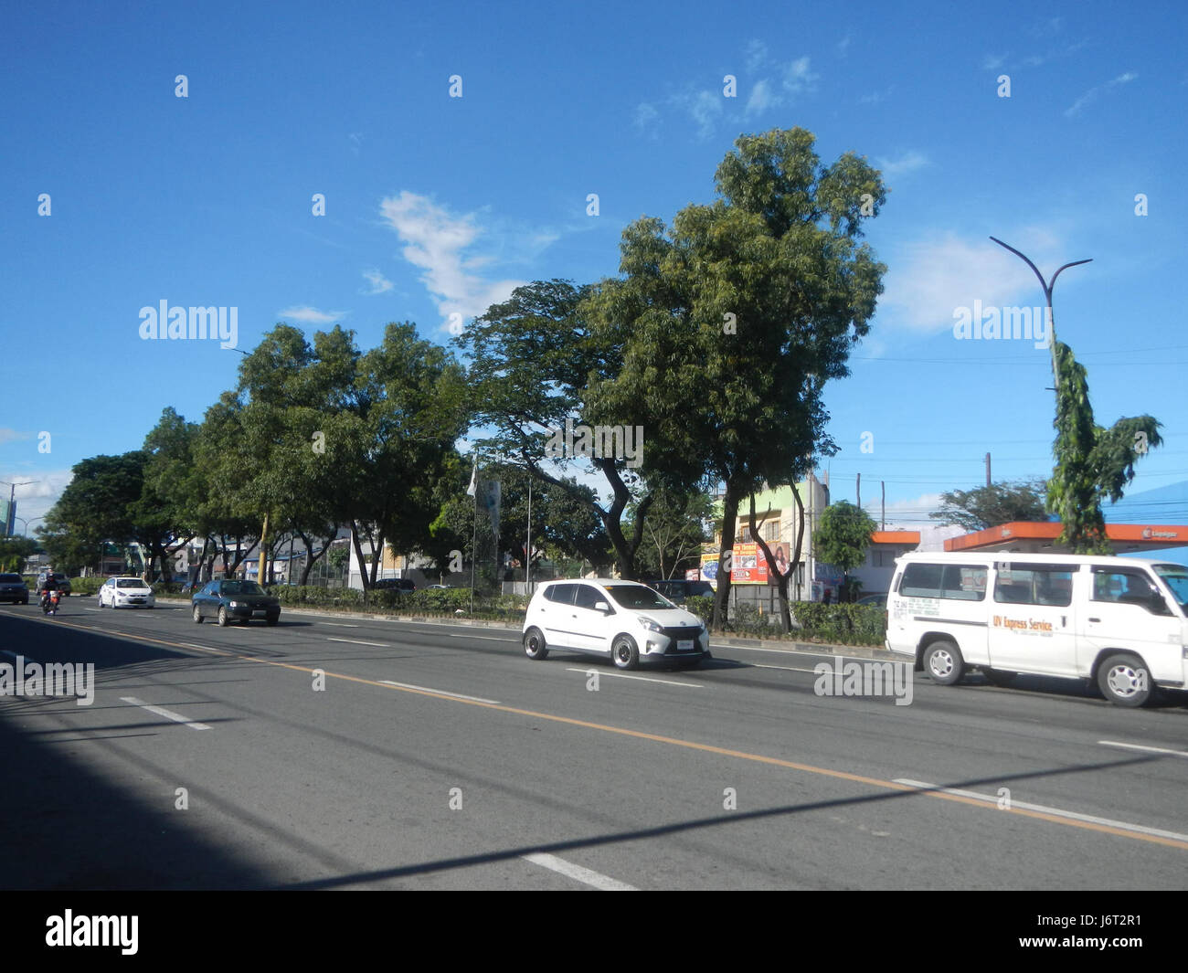 This image highlights SM City Marikina, located near the Marcos Bridge ...